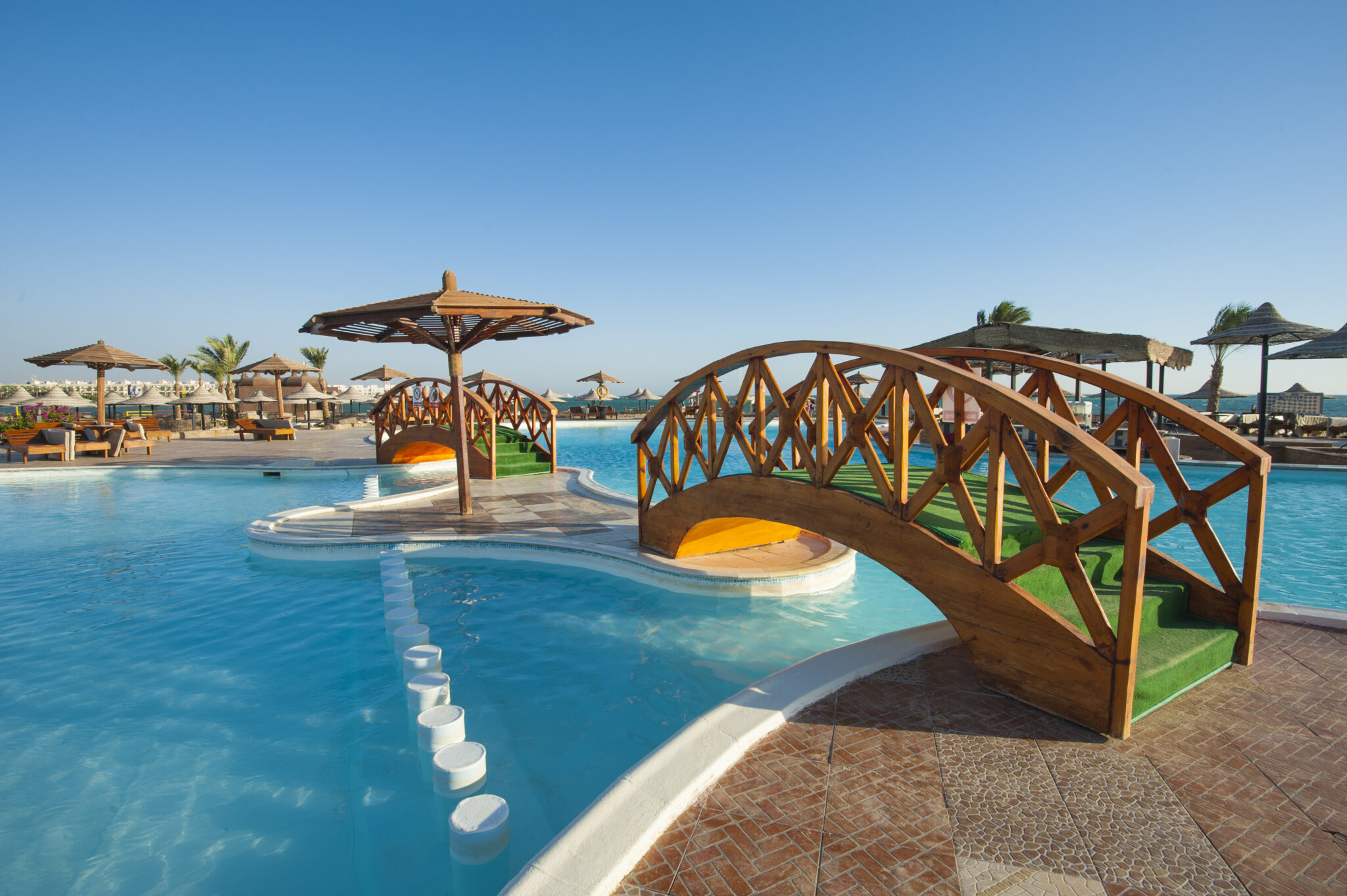 Bridges and Platforms Enhancing the Pool Experience - Tiki Pools